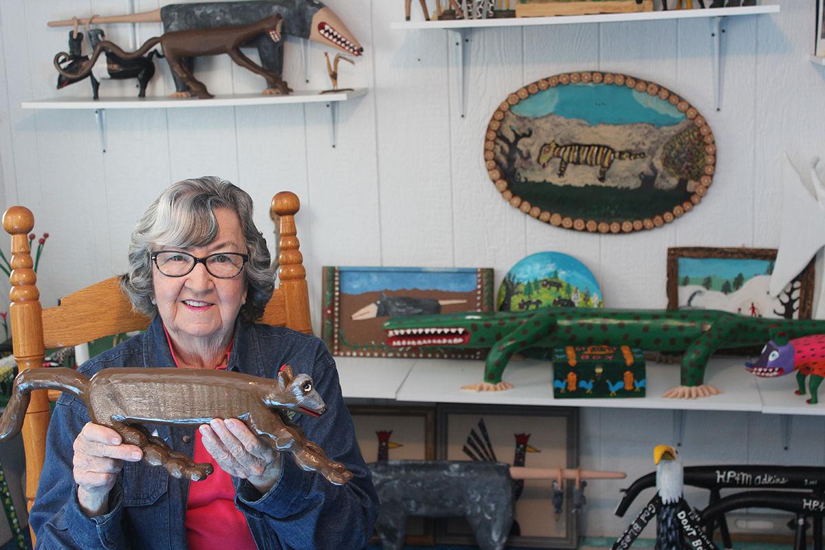 Folk artistry: Elliott native Minnie Adkins whittles while she works ...