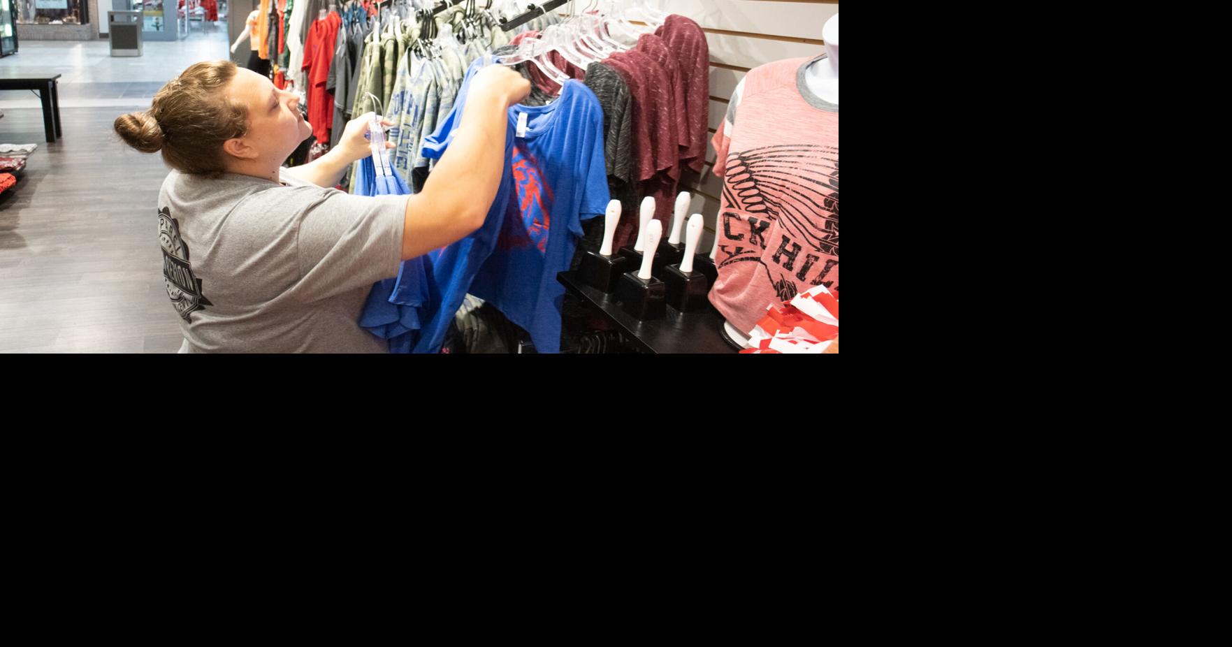 Sizing up school spirit: New store in mall features high school sports ...