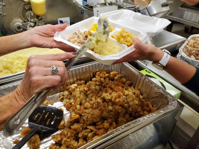 272 free Thanksgiving meals distributed by Larry's Pizza and Subs in ...