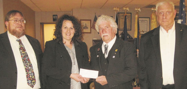 Elks donate $1,800 to community center, surprise one of their own with ...