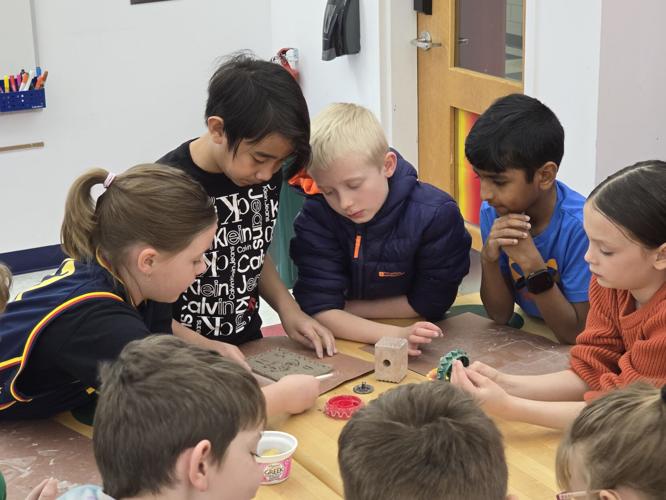 Artist-in-residence helps Kelly Elementary students create ceramic ...