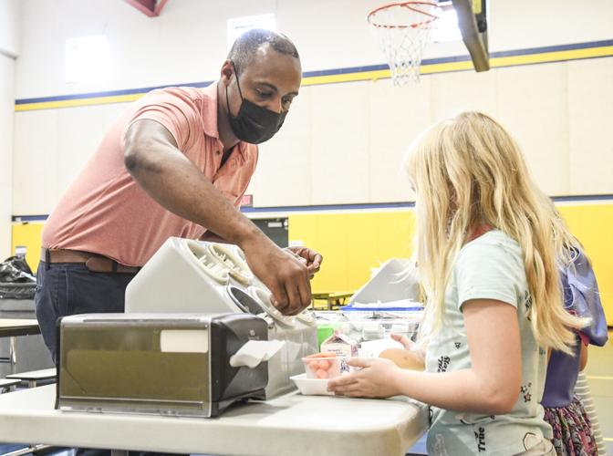 Parent volunteers help maintain daily routines at Kelly Elementary ...