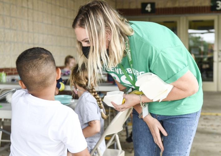 Parent volunteers help maintain daily routines at Kelly Elementary ...