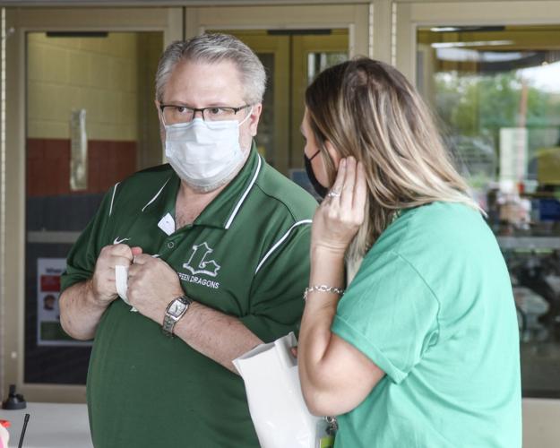 Parent volunteers help maintain daily routines at Kelly Elementary ...