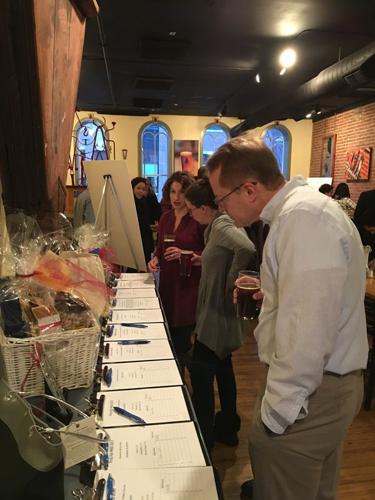 Guests eat and drink for a good cause at Pints for Peds | Local News ...