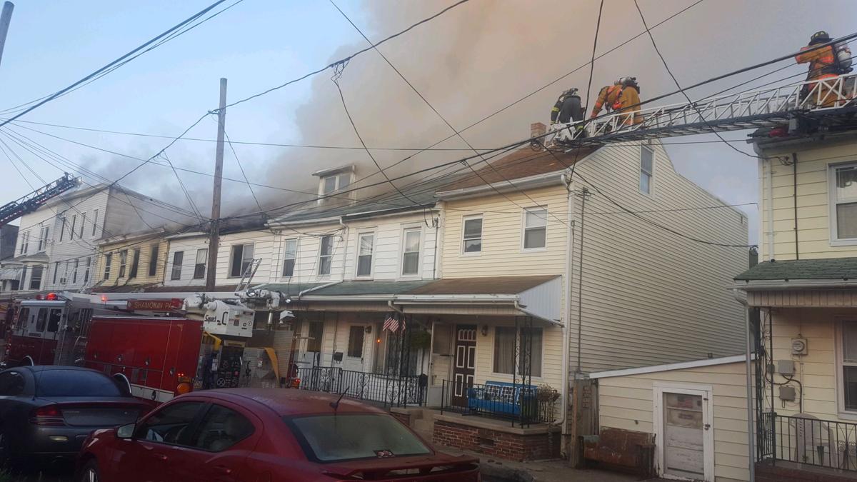 PHOTOS: Fire strikes row homes in Shamokin | | dailyitem.com