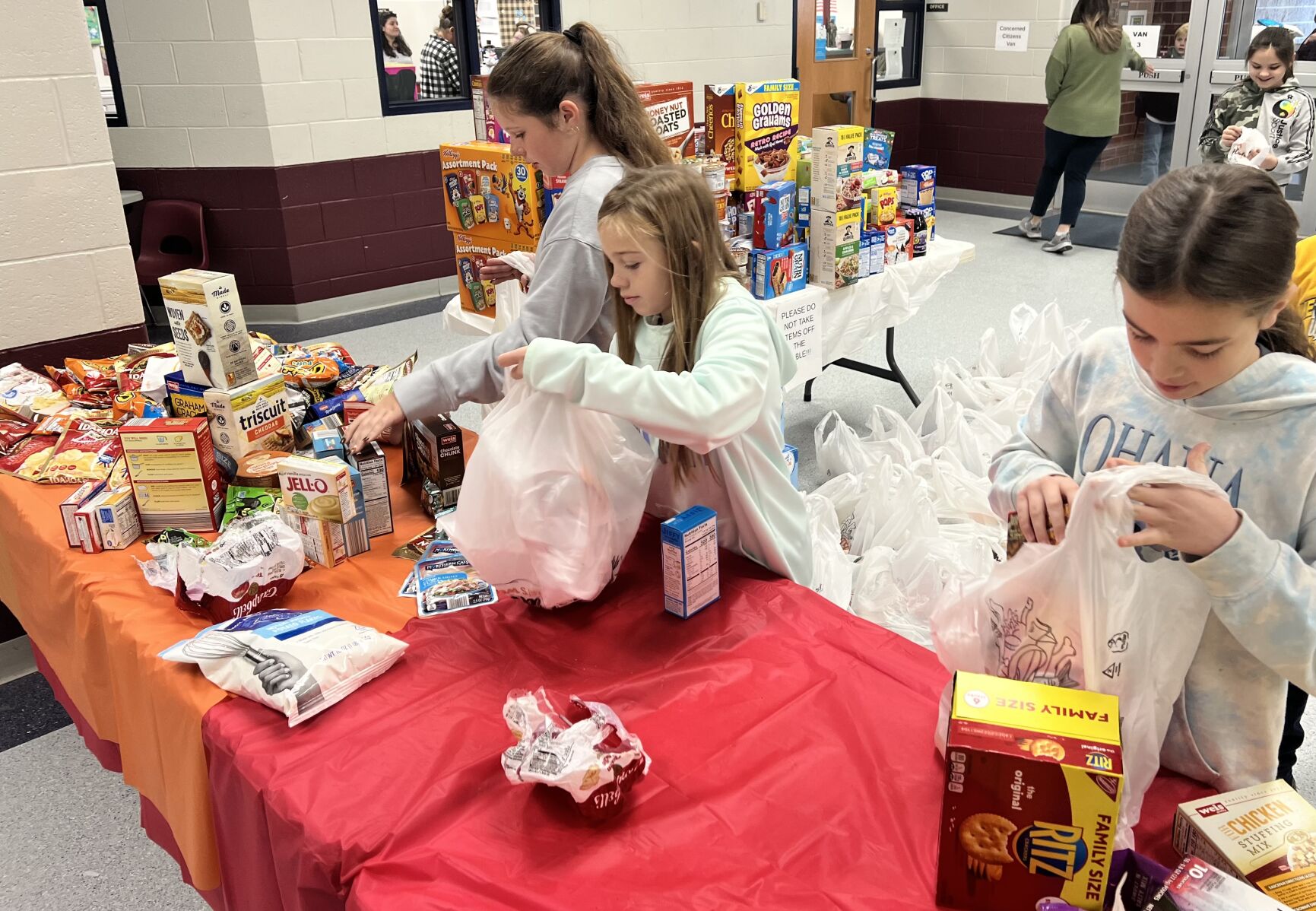 Shik kids donate food for Thanksgiving meal giveaway | News | dailyitem.com