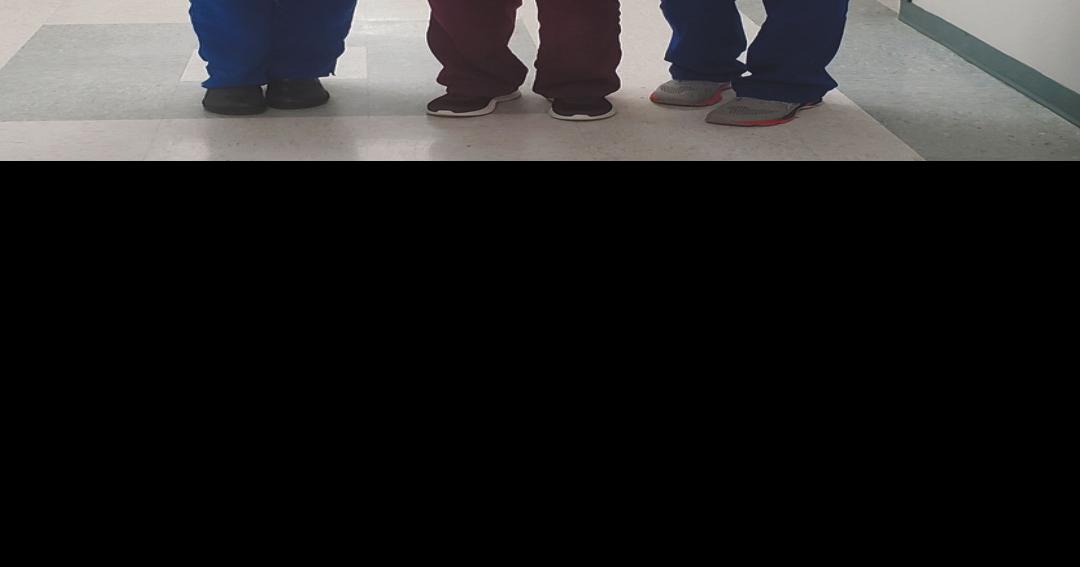 Nursing working with family at Geisinger Shamokin during pandemic ...