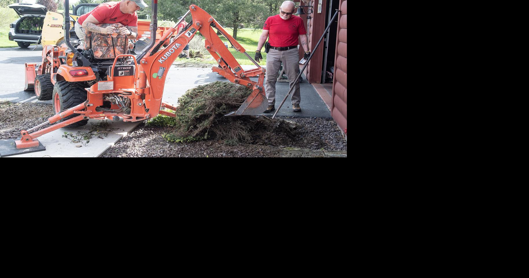 Combat veterans group helps landscape home of former Marine | News ...