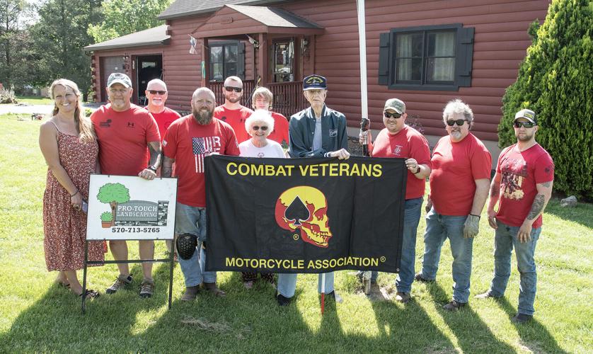 Combat veterans group helps landscape home of former Marine | News ...