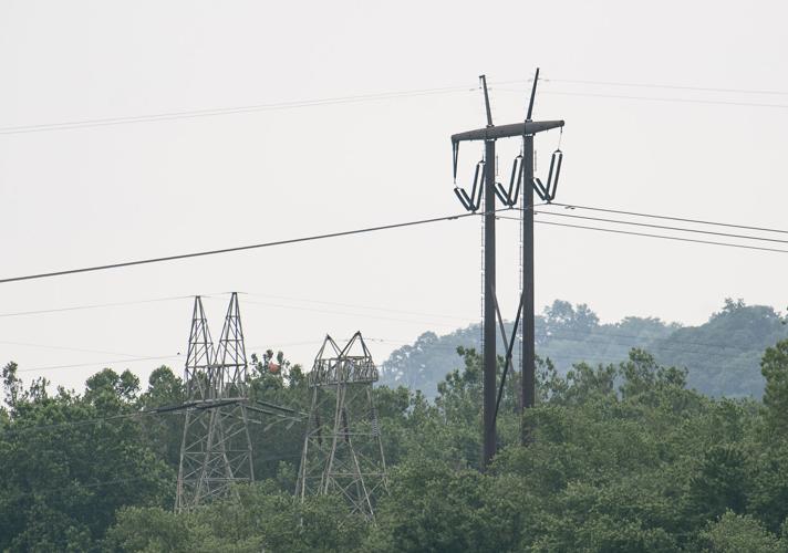 Barge in Susquehanna River will help PPL crew rebuild transmission line ...