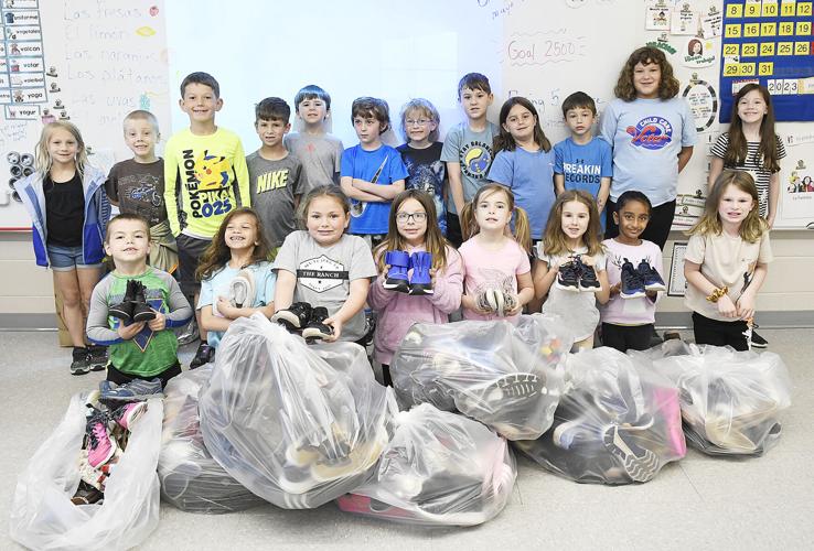 Danville Primary School Running Club Members Holding Shoe Drive News danville-primary-school-running-club-members-holding-shoe-drive-news