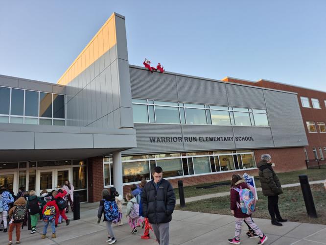 Elves on the Watsontown Elementry School roof greet hundreds of ...