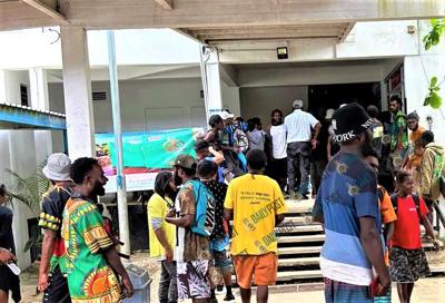 Overcrowding at Immigration Office as thousands rush to collect ...