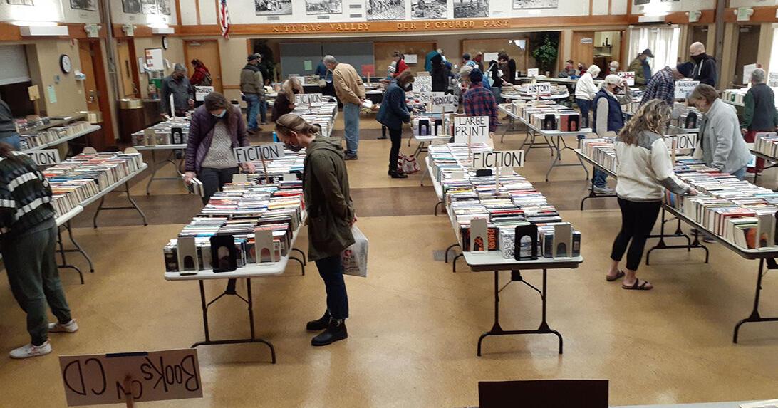 'Upstairs' book sale to benefit Ellensburg Library, Hal Holmes ...