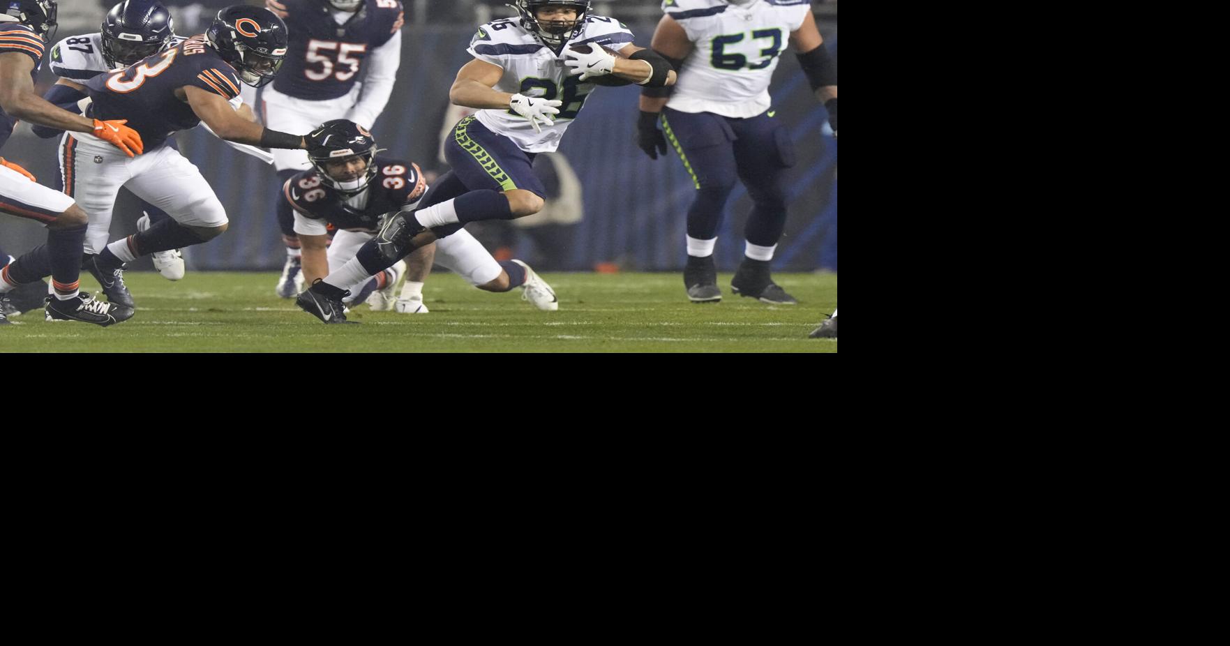 Woolen's late interception seals win as Seahawks beat struggling Bears 6-3 to boost playoff ...