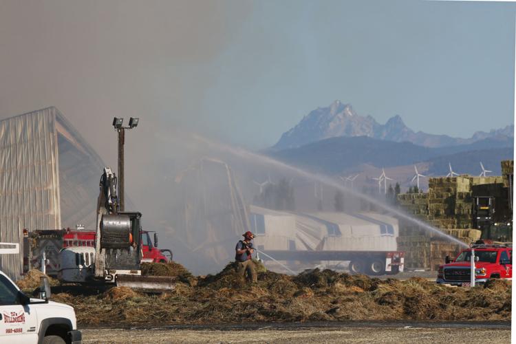Three-alarm fire breaks out overnight at Anderson Hay and Grain | All ...