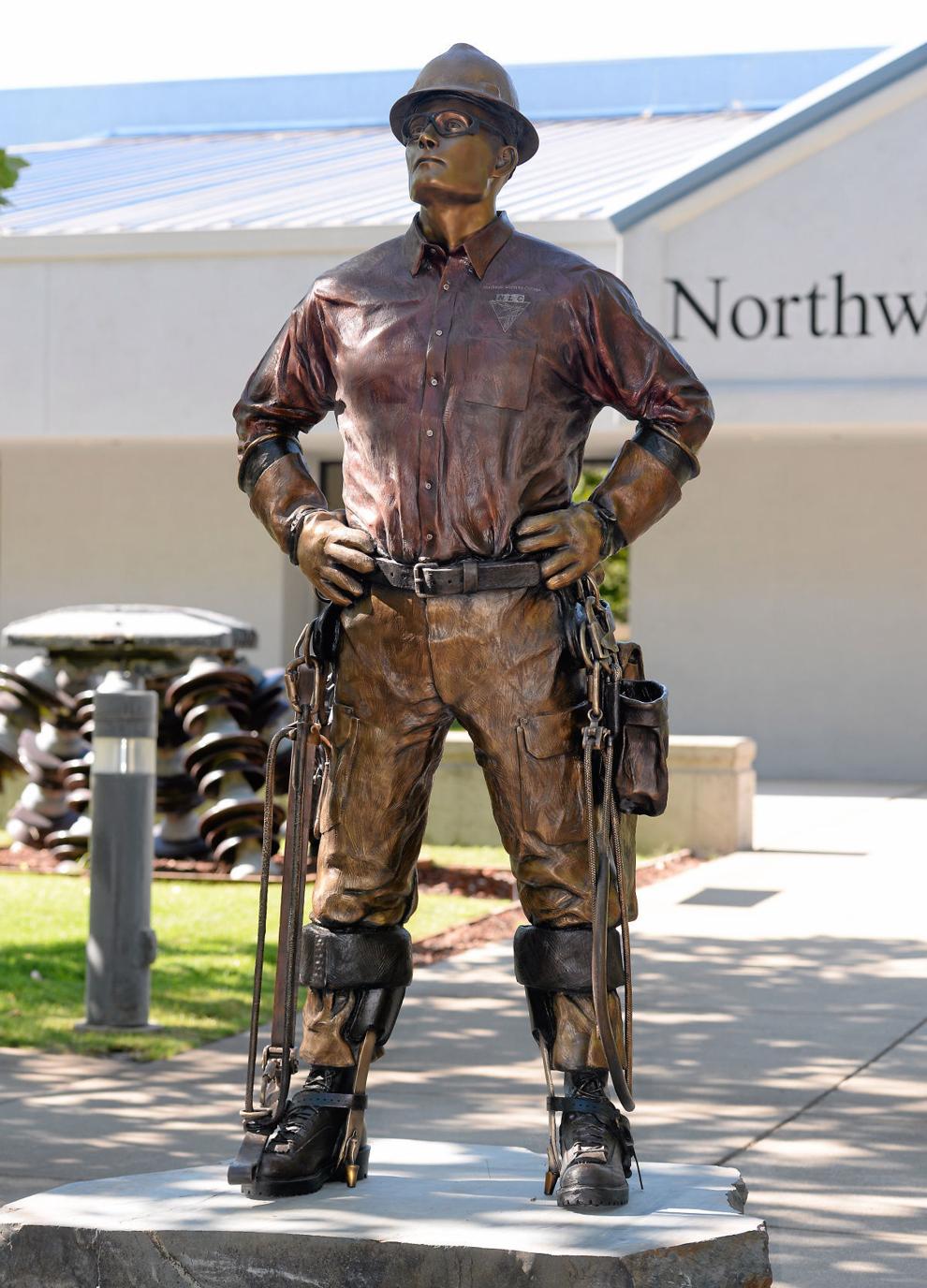 Artist showcases bronze cast statue of electrical lineman on way to ...