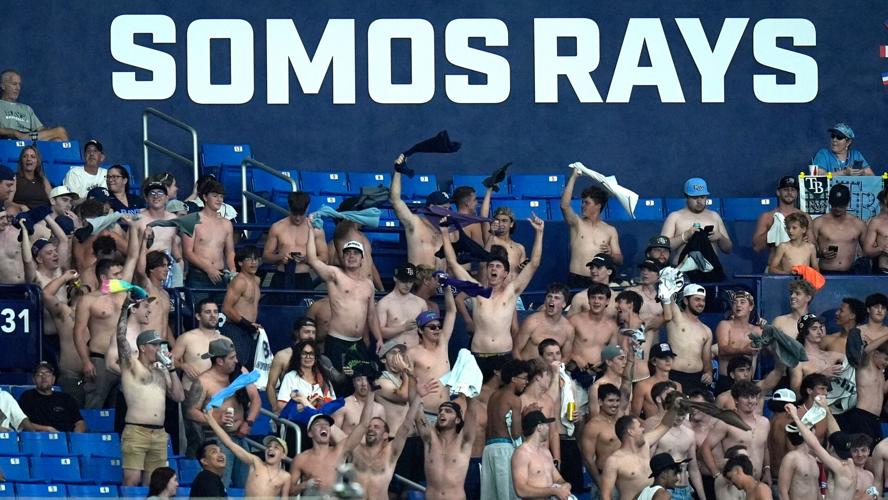 Shirtless fans the stars at MLB stadiums as 'Tarps Off' trend sweeps ...