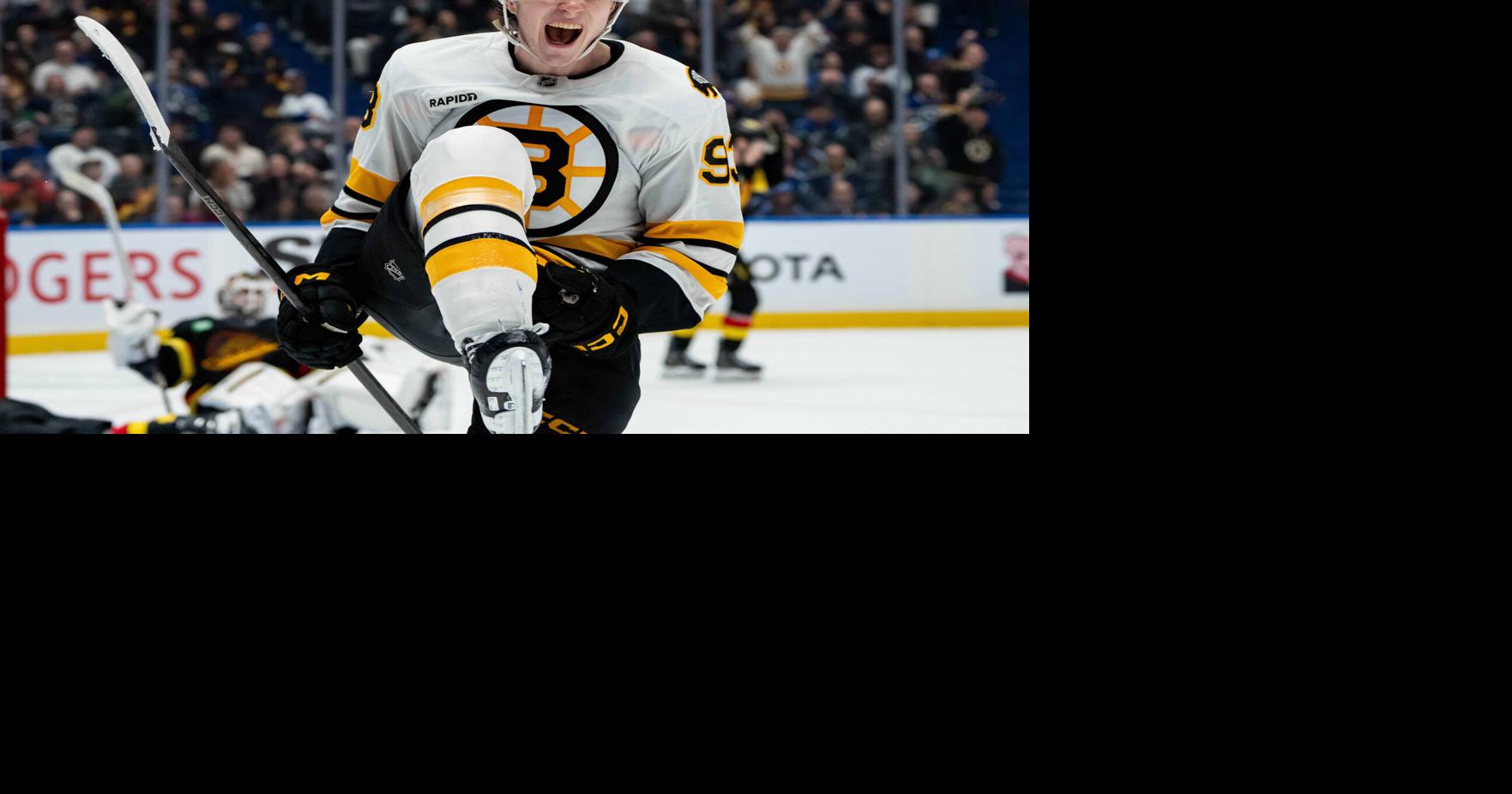 Minten scores twice in huge homecoming to lift Bruins over Canucks 3-2 ...