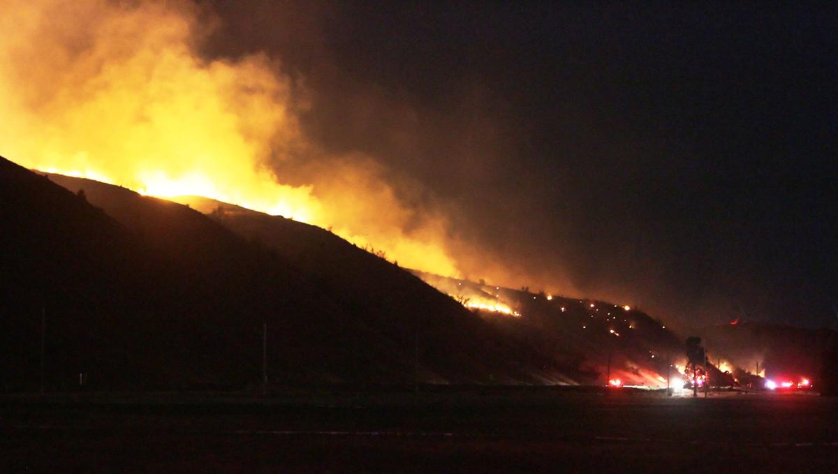 Firefighters contain brush fire on 97, investigate haystack fire | News ...