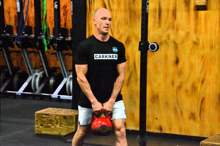 Survival of the CrossFittest: Carkner training for latest Wodapalooza ...