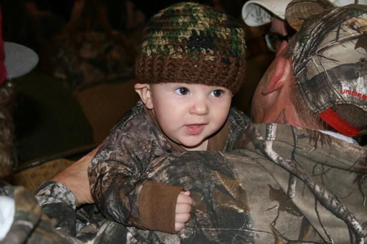 Kenny Rhodes’ life celebrated with stories, camo and redneck yells ...