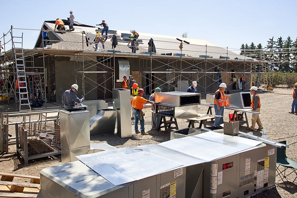 Volunteers help with Jehovah’s Witness building remodel | Members ...