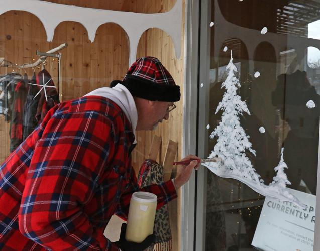 Storefront painter brings out the holiday cheer | News ...
