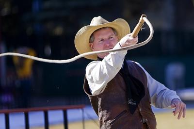 Cowboy performer Bink Picard gives the audience a crack at his craft ...