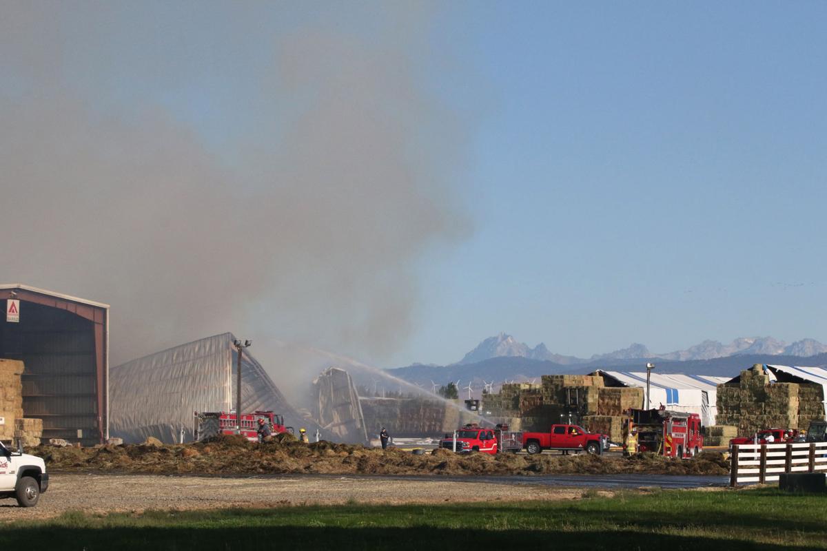 Three-alarm fire breaks out overnight at Anderson Hay and Grain | All ...