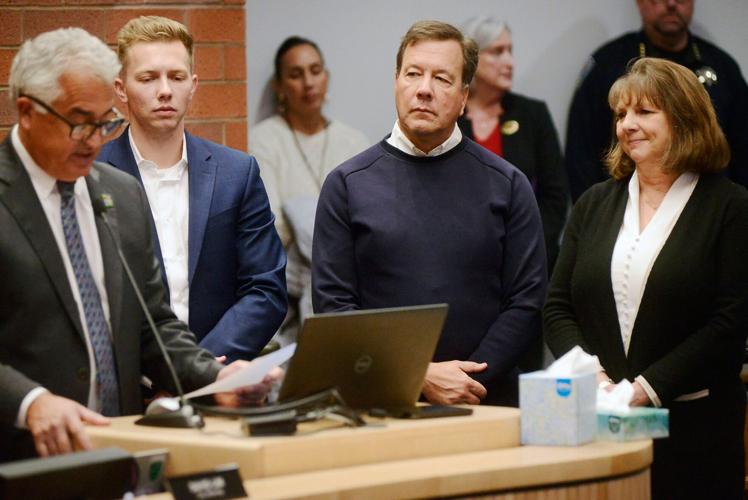 Somber tone fills City Hall as council transitions from old to new ...