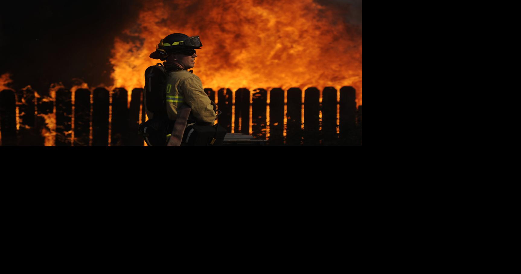 Photos: Fire burns along railroad tracks damaging houses | News ...