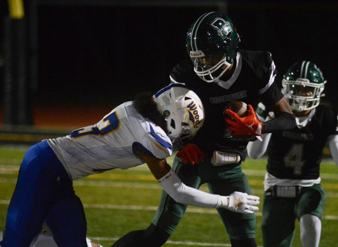 Slow start, fast finish as Rodriguez football claims share of MEL title ...