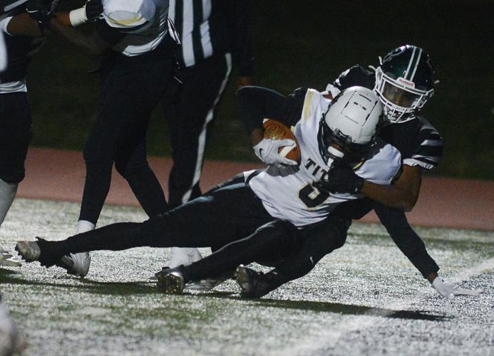 Playoff Football Roundup: Rodriguez holds on to win opener in OT ...