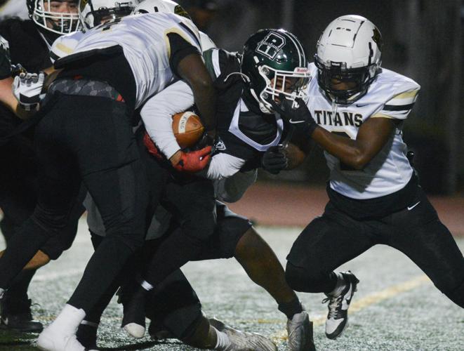 Playoff Football Roundup: Rodriguez holds on to win opener in OT ...