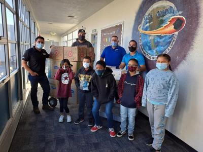 Ball Metal crew delivers donated school supplies from September car ...