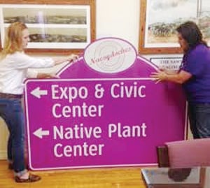 Workers prepare to install wayfinding signs in town | Local News ...