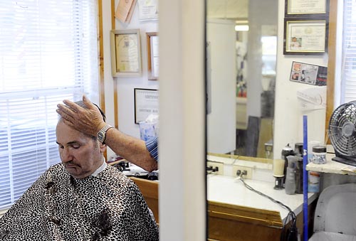 Old-fashioned barber shops still offer all the atmosphere, none of the ...
