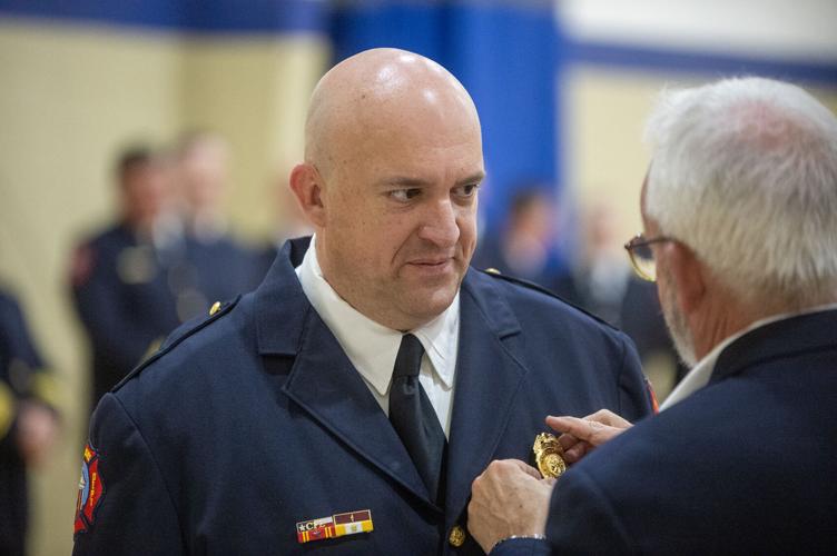 Fire department promotes 17 in long-delayed program | Local News ...