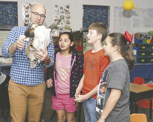 Smiles and science: Tom Daniels students experience hands-on learning ...