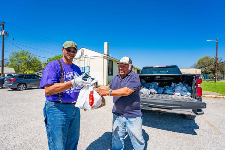 Photo gallery: Keeping the community fed, informed at Doyle School ...