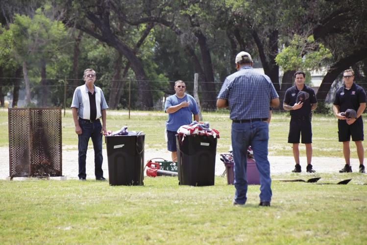 Worn and frayed flags retired honorably with flames | News | dailytimes.com