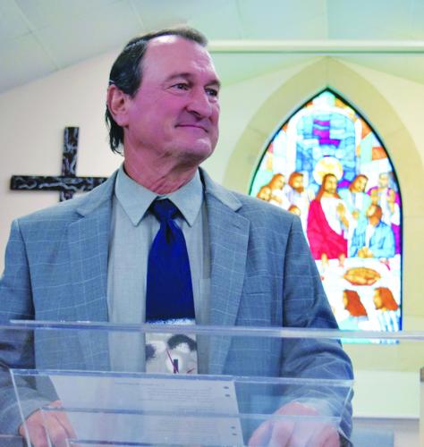 Look! Up at the pulpit! It’s Elvis! It’s Davy Crockett — no, it’s ...