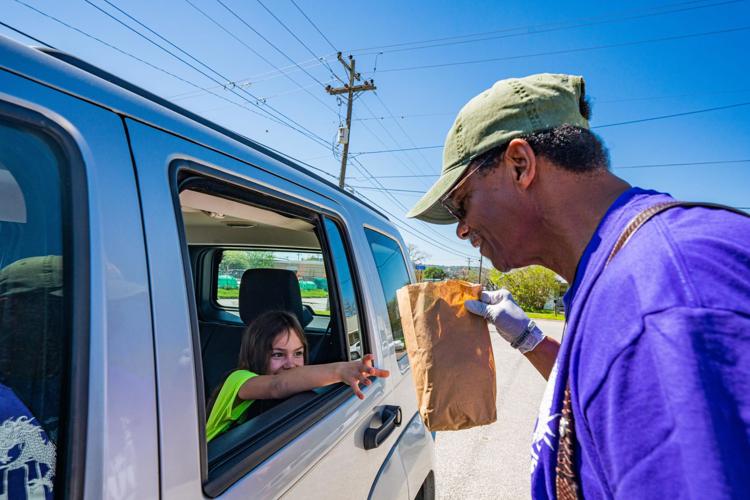Photo gallery: Keeping the community fed, informed at Doyle School ...