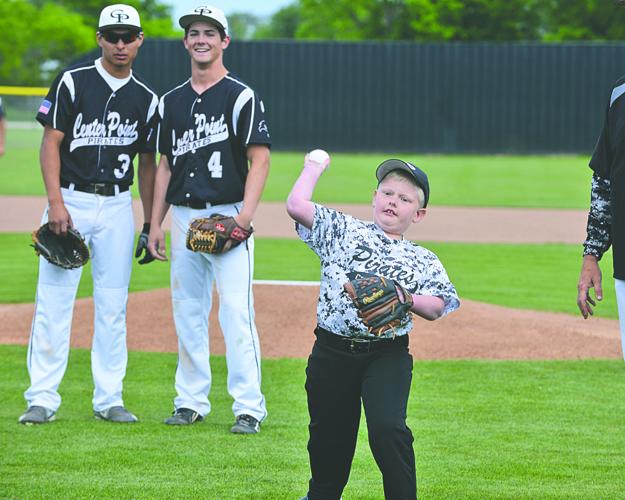 Nine-year-old Shawn Singleton beats odds to throw first pitch, inspire ...