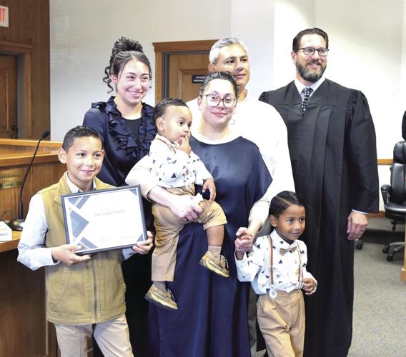 Locals make their families ‘official’ for National Adoption Month ...