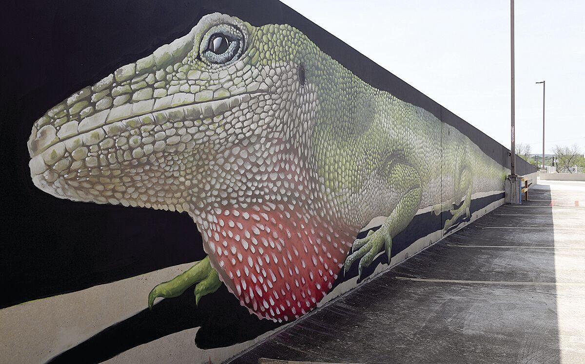 Houston artist creates giant lizard in parking garage | News ...
