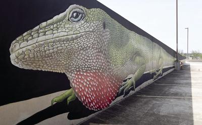 Houston artist creates giant lizard in parking garage | News ...