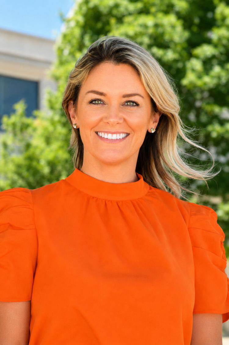 Behind the dais: Crystal Smith's background has led her to this moment ...